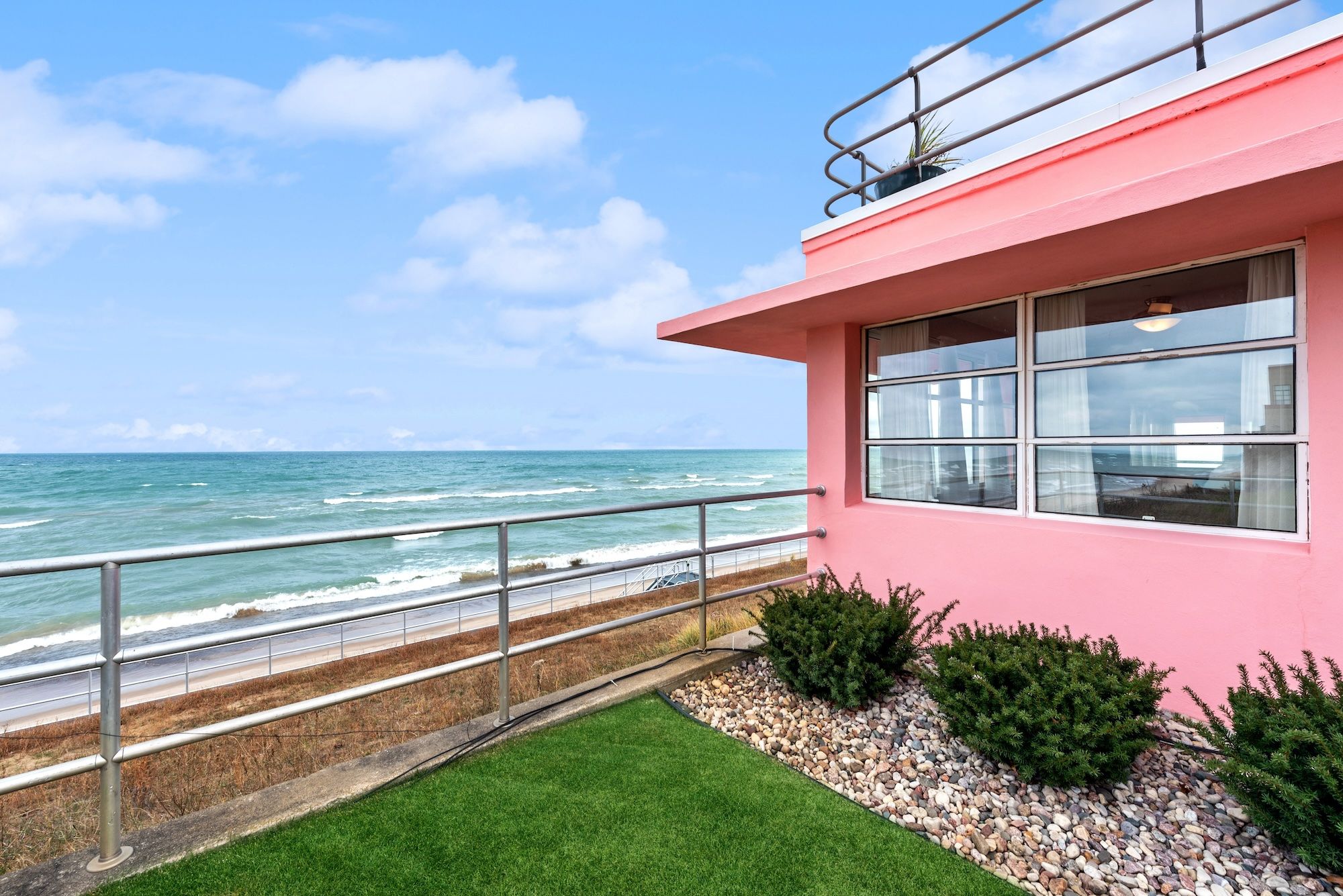 Pink "Florida Tropical House" in Beverly Shores for lease - Axios Chicago