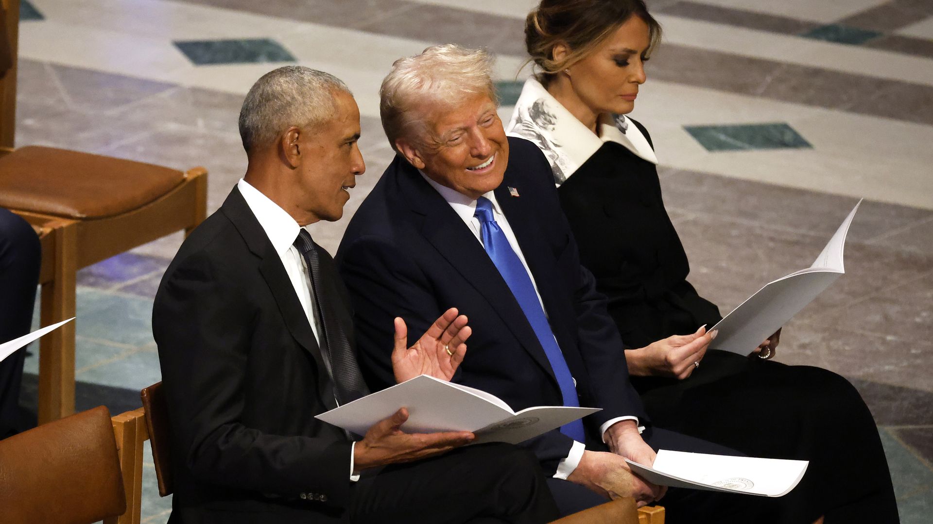 Trump and Obama share a laugh at Carter funeral