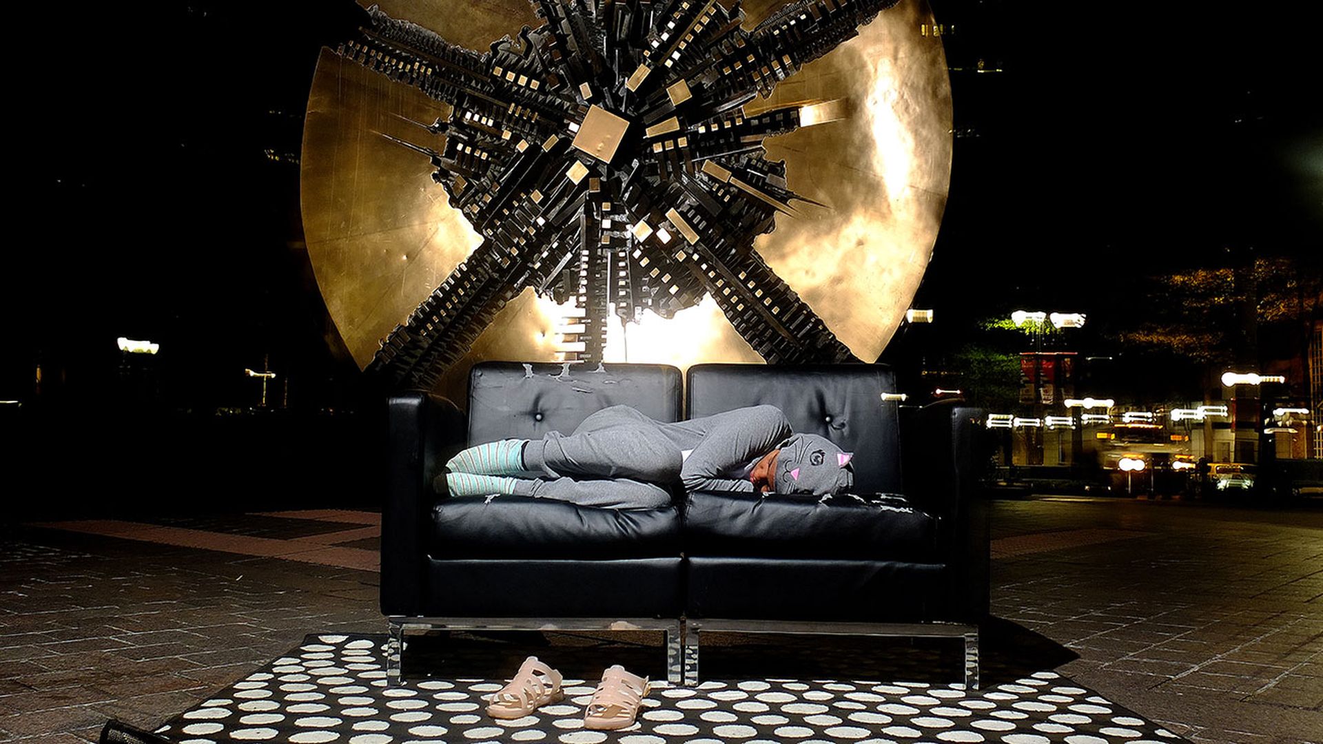 Photographer takes couch surfing to the streets, literally - Axios ...