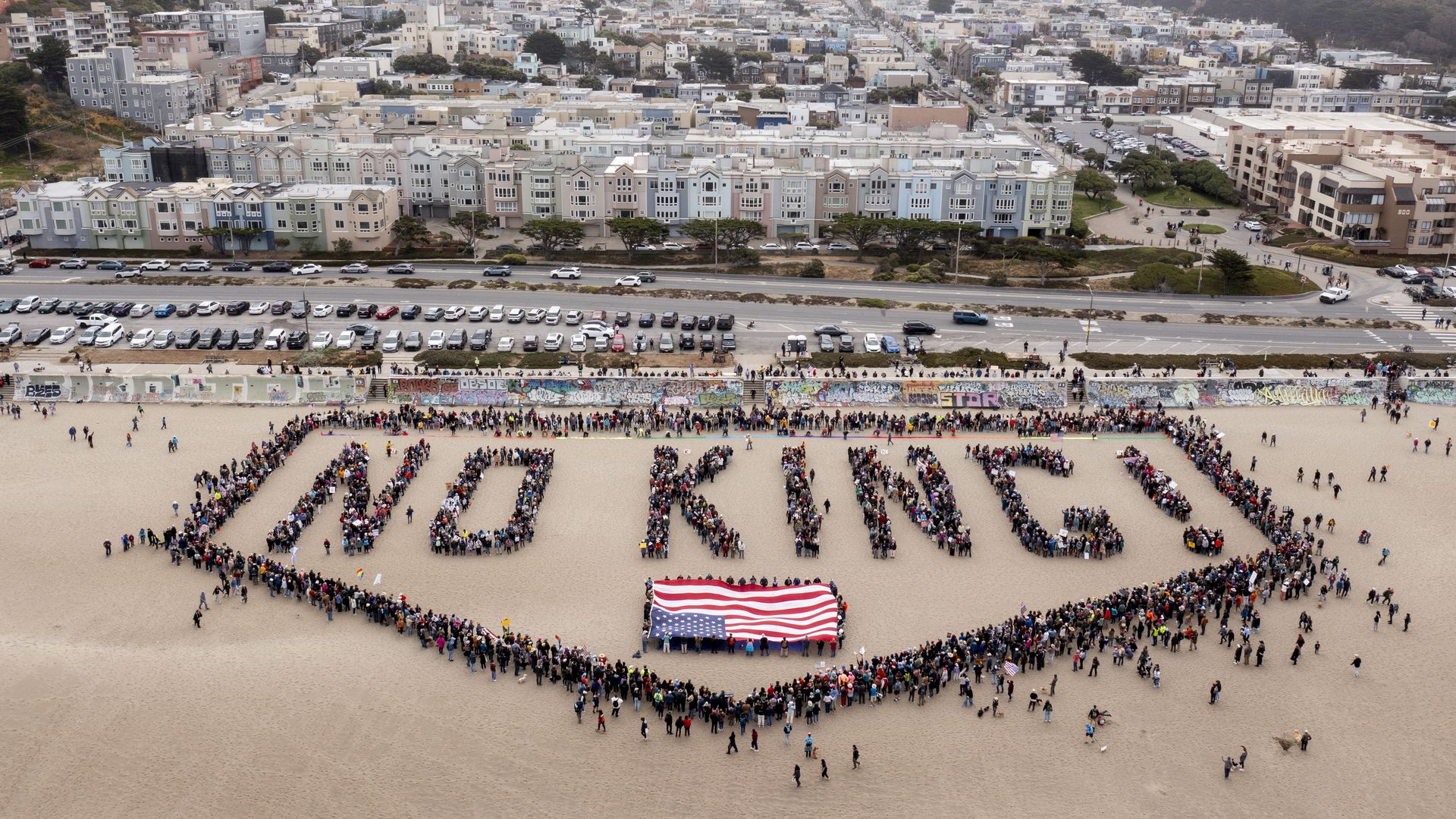 Protesters form human banner in SF as ICE protests sweep U.S. - Axios ...