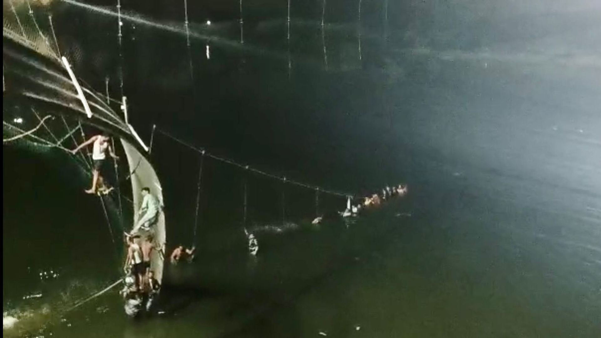 India bridge collapse leaves at least 132 dead