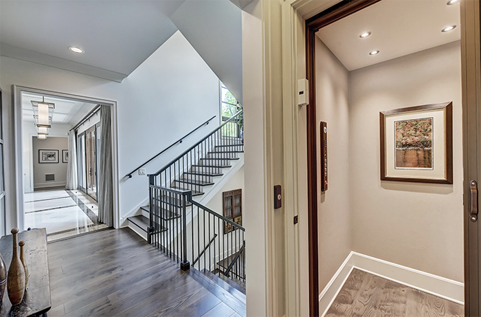 Lakefront mansion with an elevator and 280-bottle wine cellar asks $7M ...