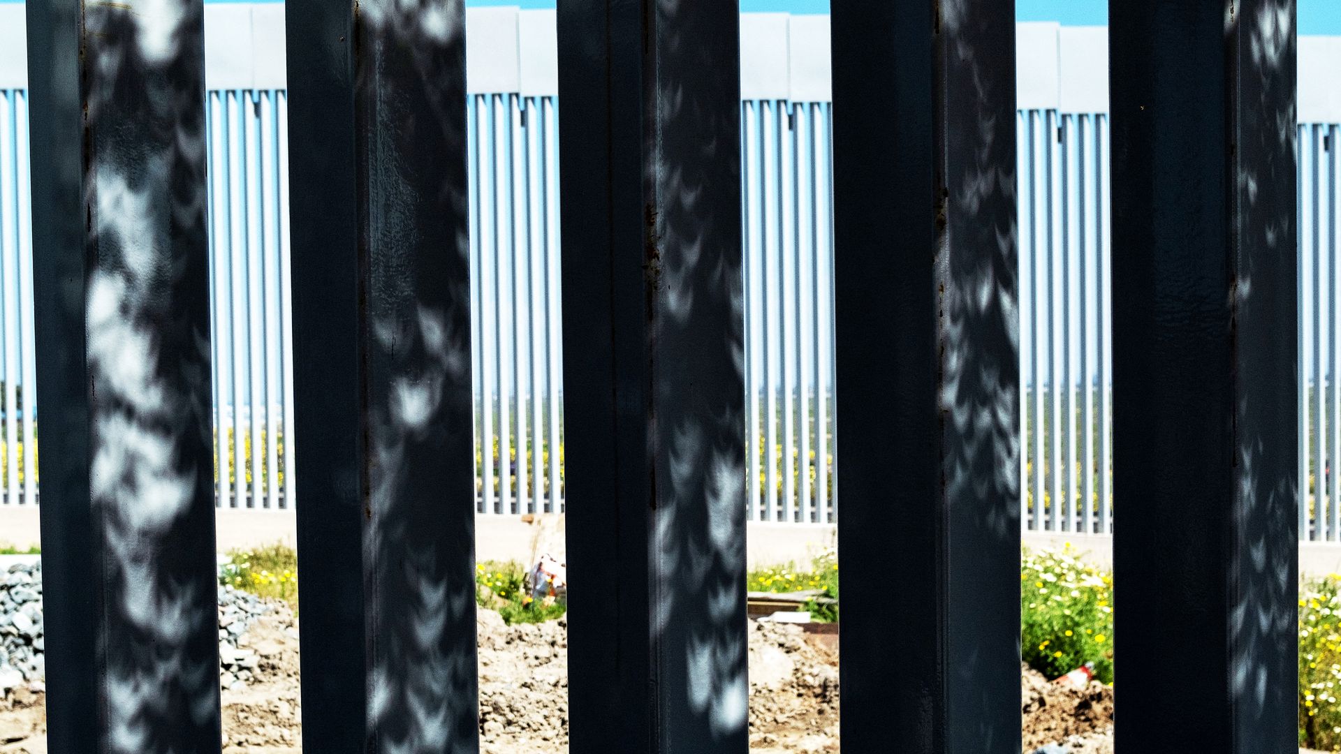 Photos: The eclipse on the U.S.-Mexico border wall - Axios San Diego