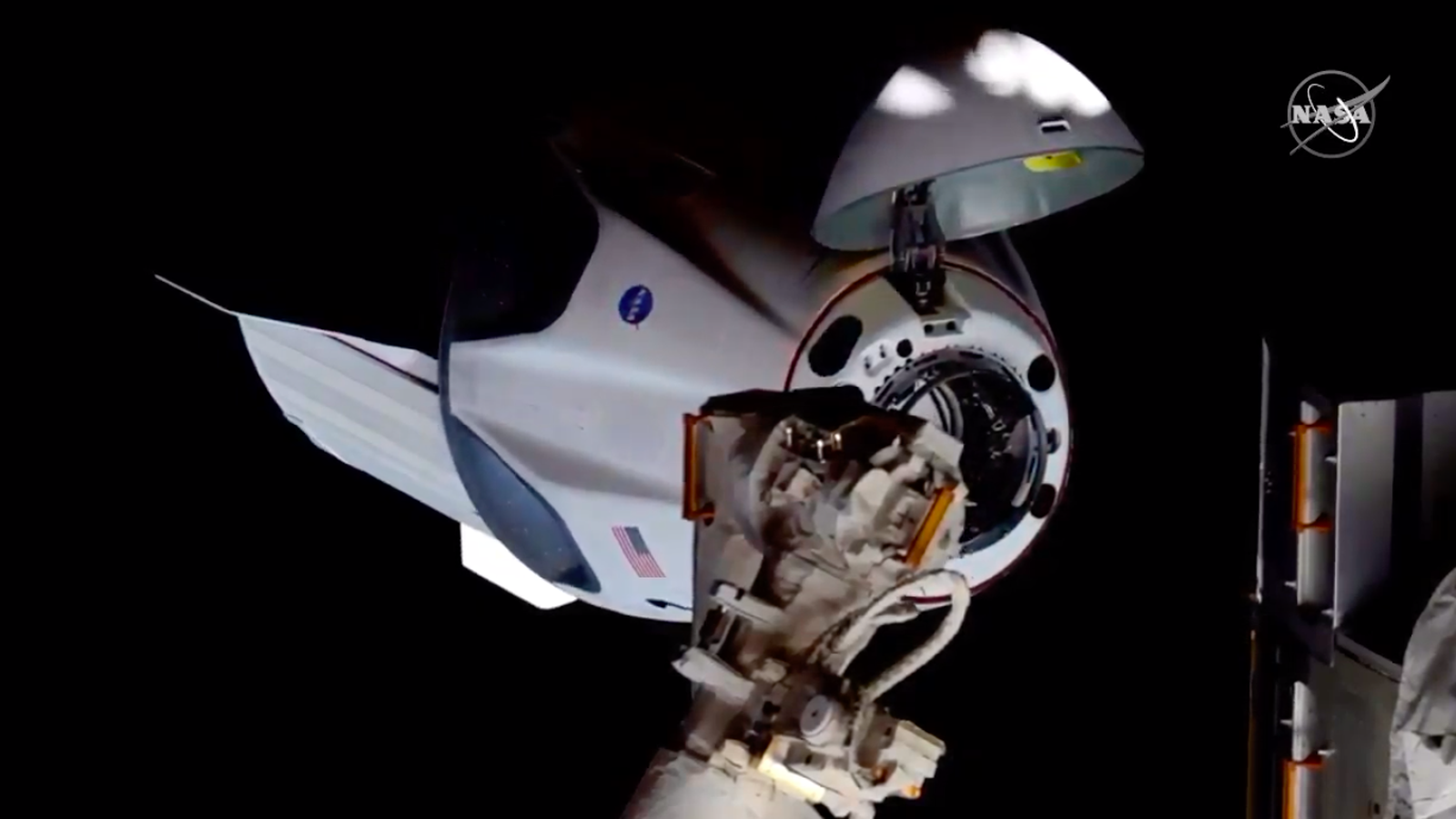 SpaceX capsule carrying astronauts docks at International Space Station