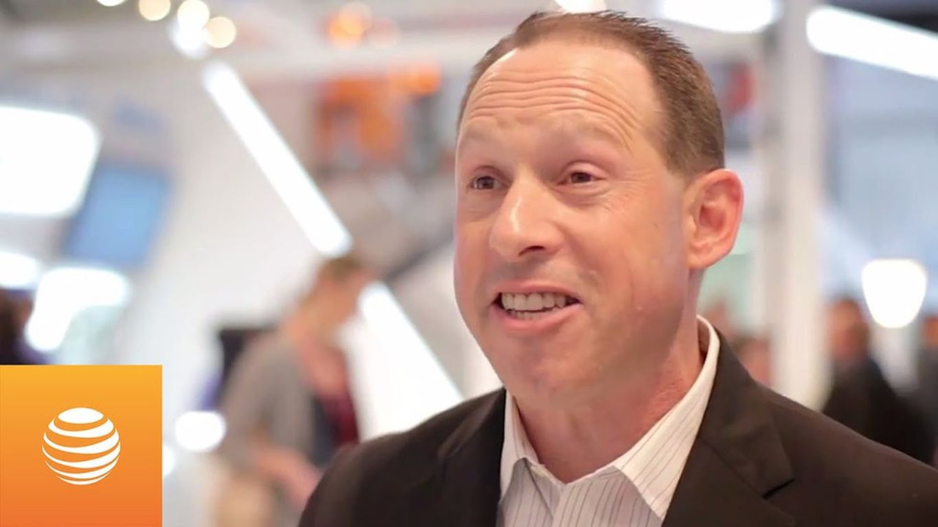 The executive who struck AT&T's iPhone deal is retiring