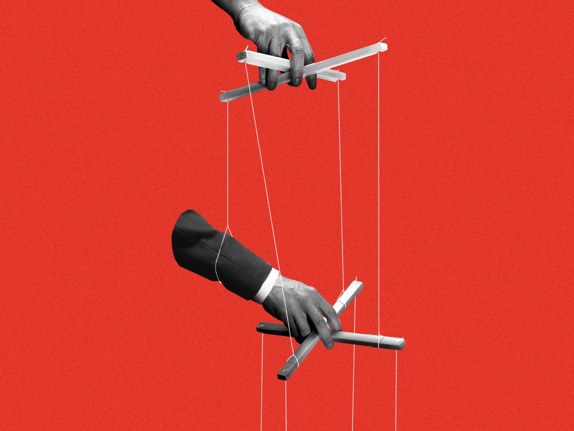 Hand Holding Puppet Strings
