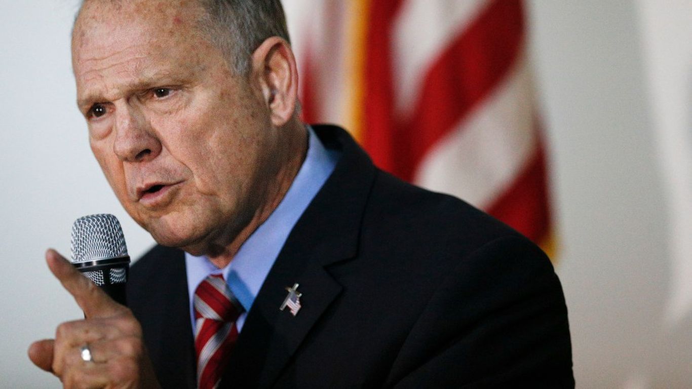 Moore denounces allegations in first public event in 11 days