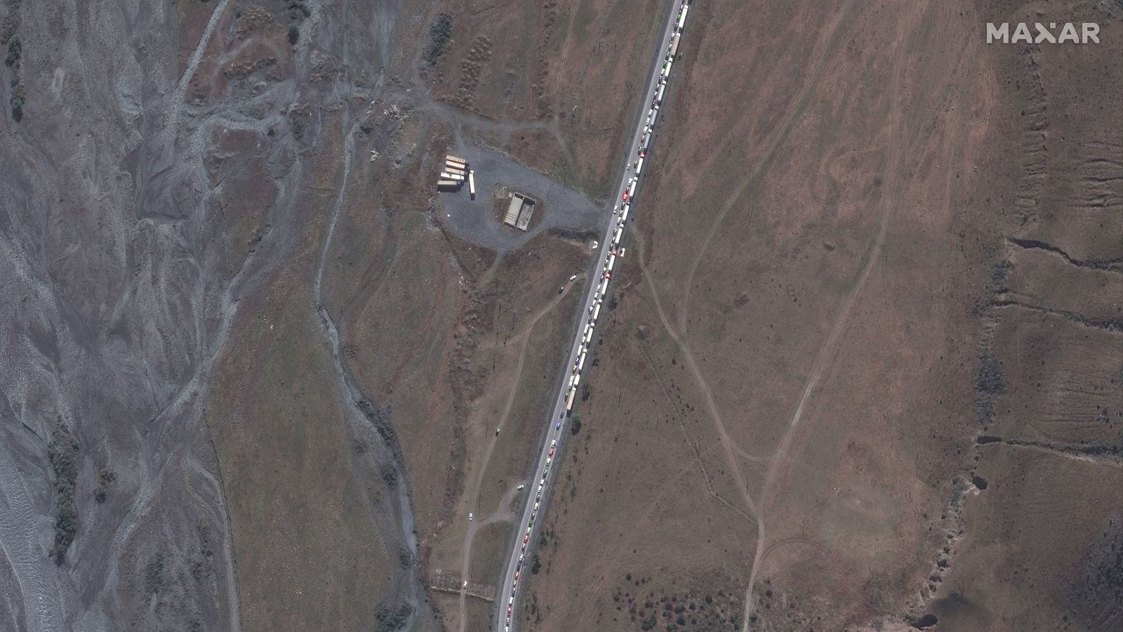 Satellite photos show 10-mile-long traffic jam at Russian border