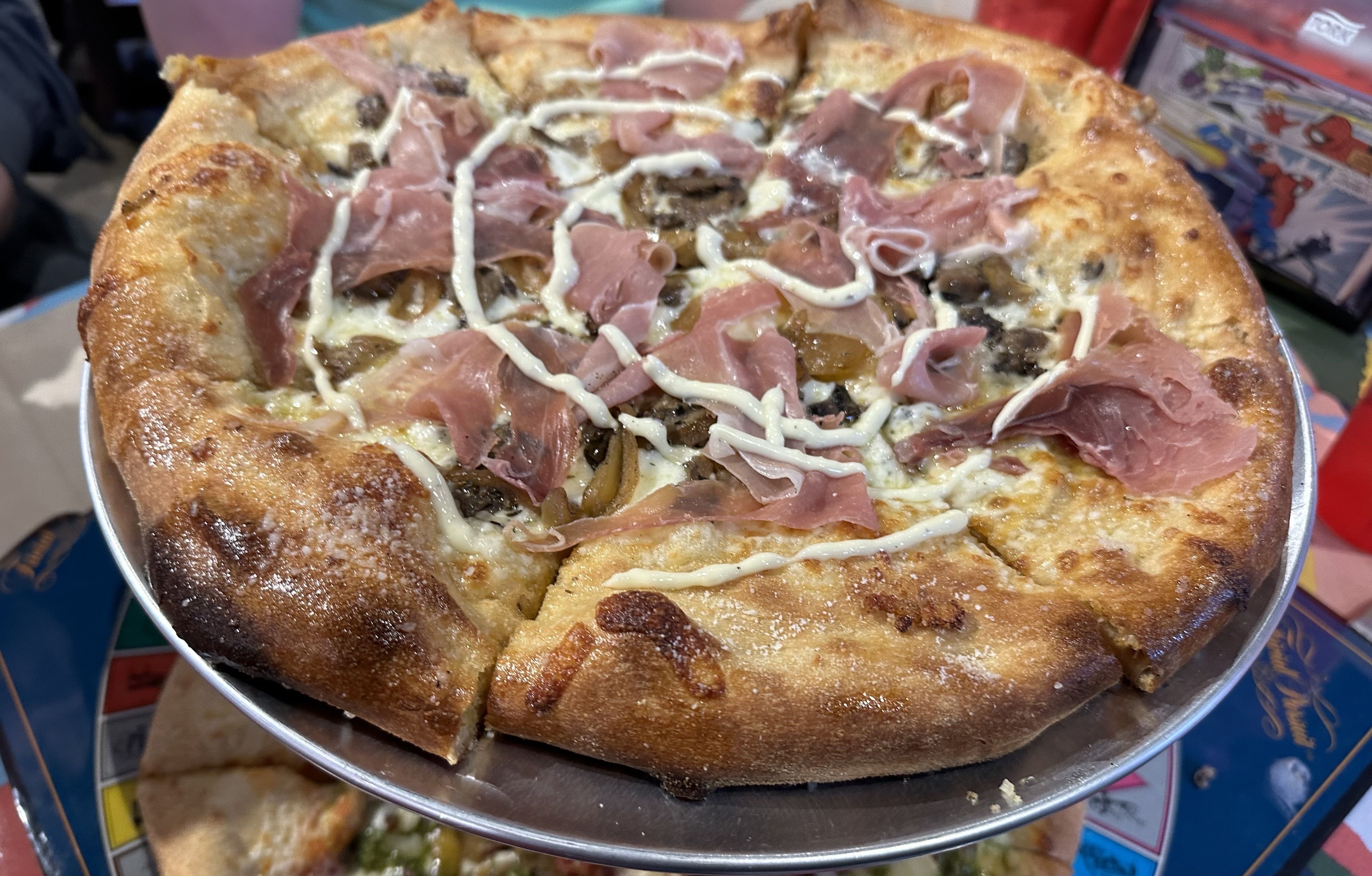 Dare to try this colossal milkshake at a throwback-themed pizza ...