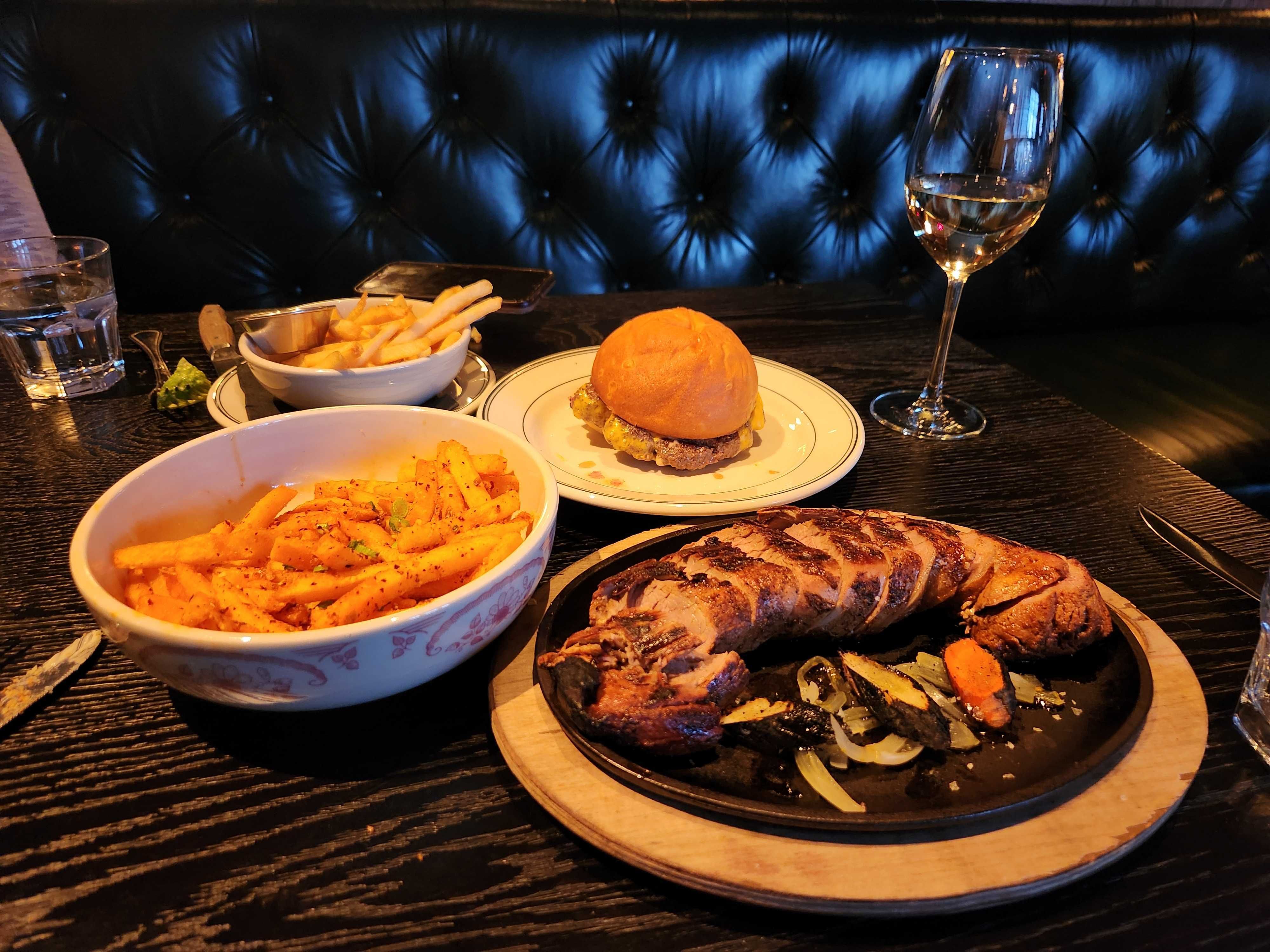 Little West Tavern review: Big flavor inside the Junto Hotel - Axios ...