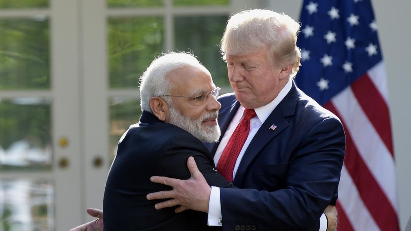 Smiles and hugs as Trump meets Modi