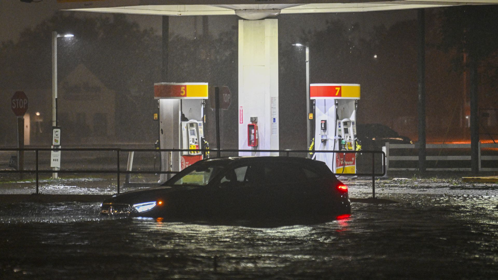 Photos: Hurricane Milton damages Florida buildings with flooding rains ...