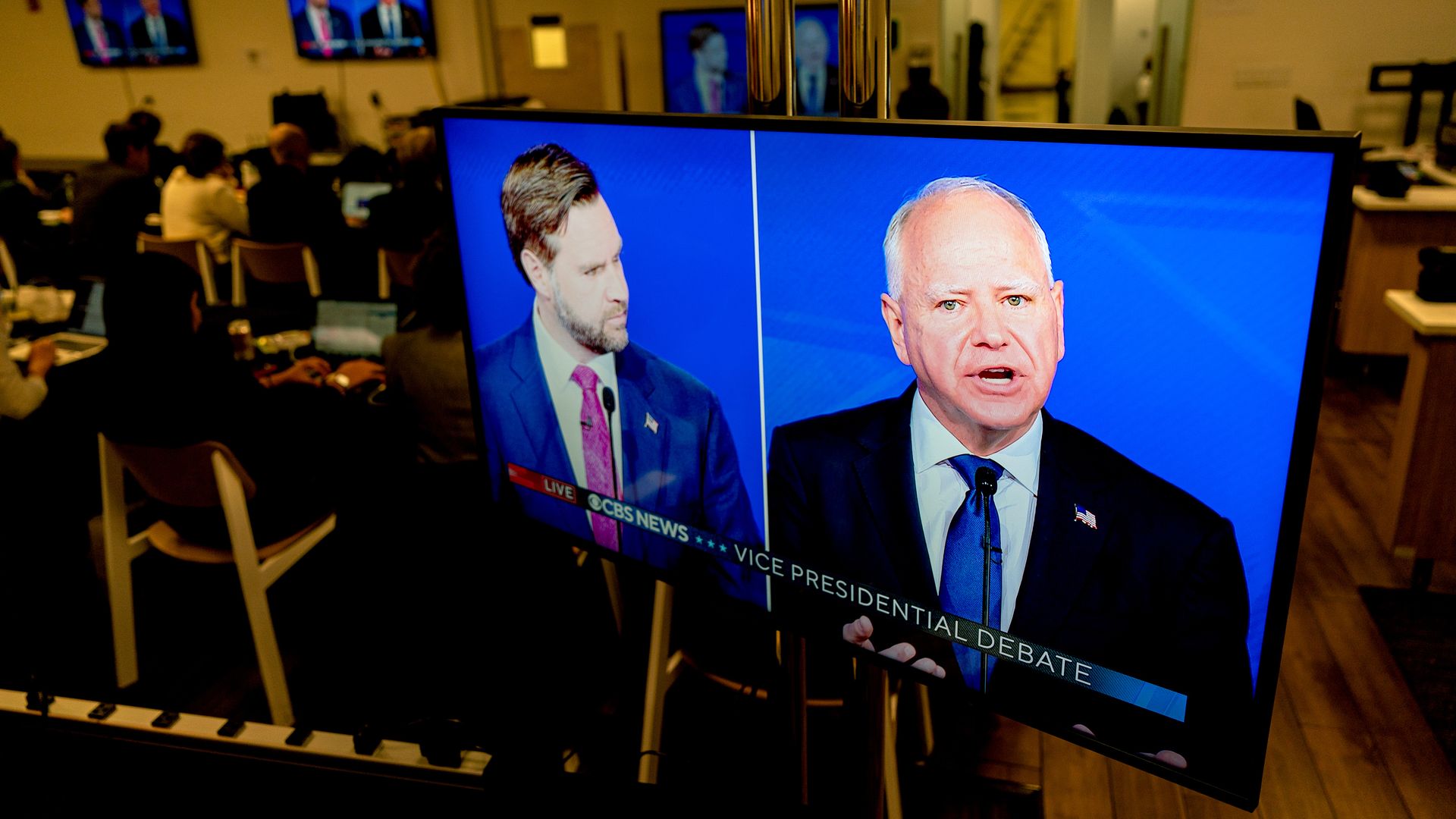 Walz in VP debate on guns says his son saw shooting