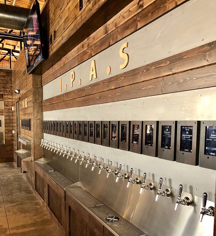 Pour Taproom, a Hoppin’-style self-serve bar, now open in Plaza Midwood ...