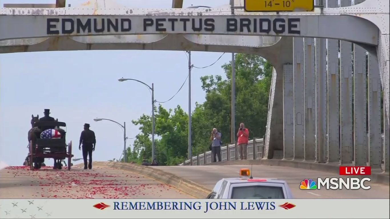 John Lewis carried across Edmund Pettus Bridge for final time