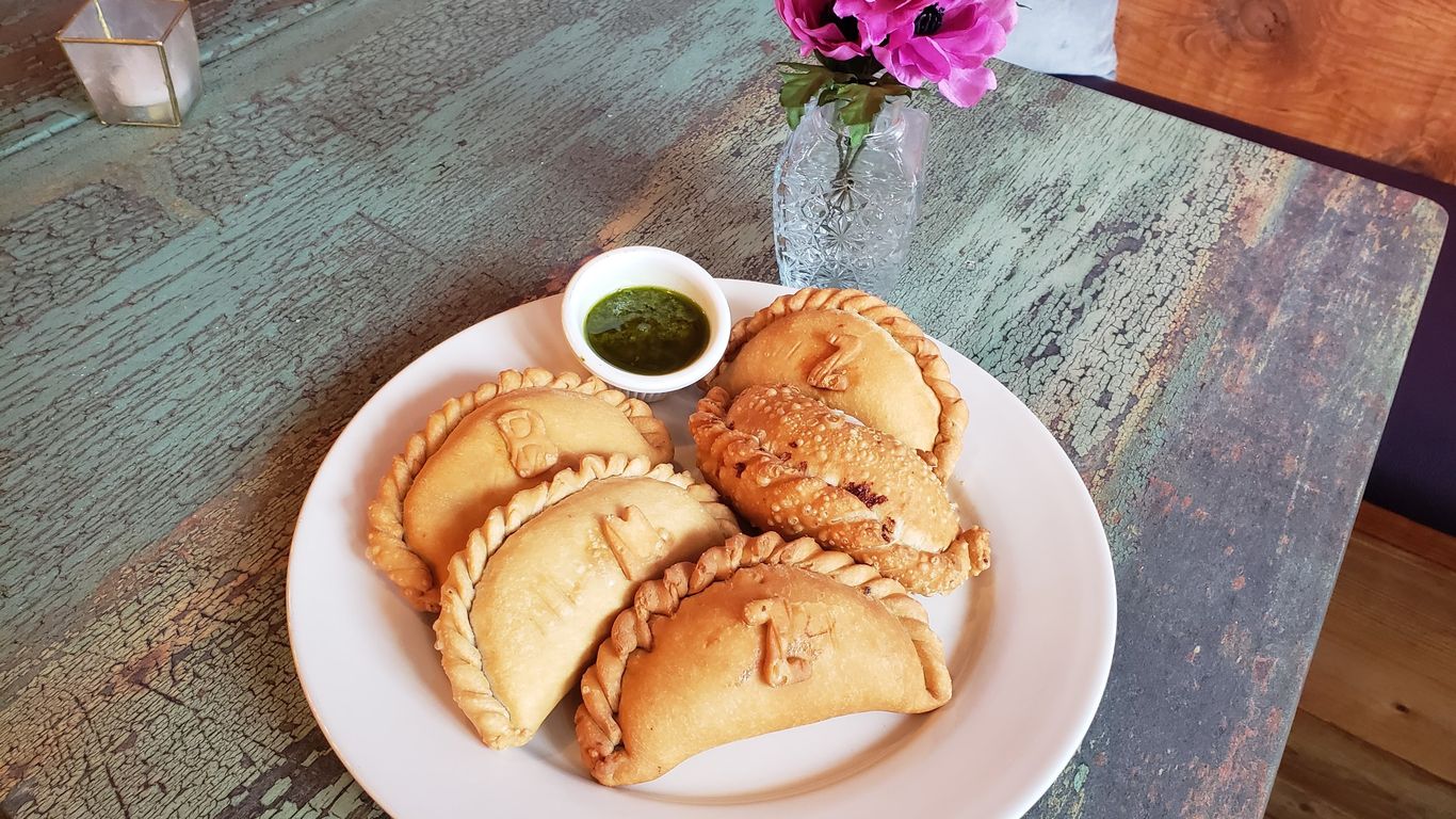 Savory Puerto Rican empanadas at West Town's Empanada Mama - Axios Chicago