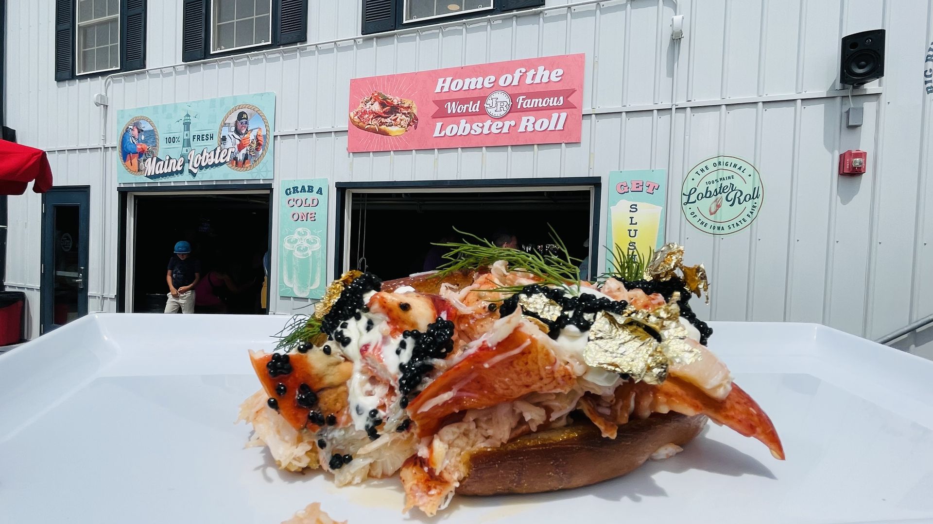 We tried this over-the-top Iowa State Fair $100 lobster roll - Axios ...
