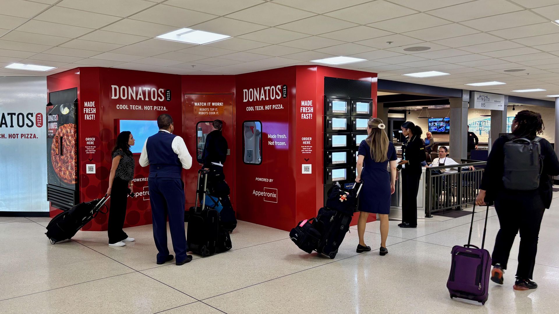 We tried the Donatos robot pizza at the Columbus airport - Axios Columbus