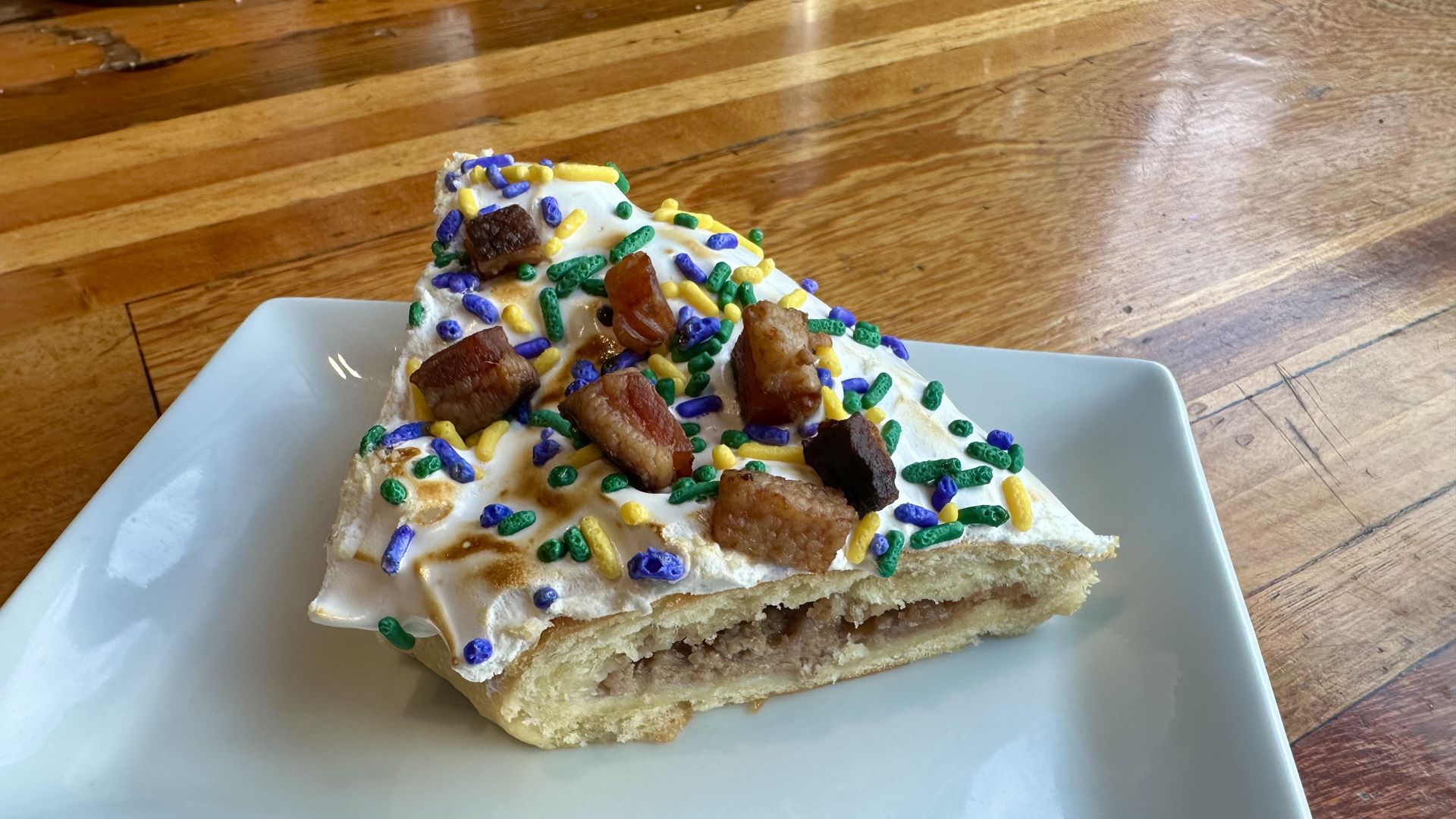 Elvis king cake delights at Cochon Butcher - Axios New Orleans