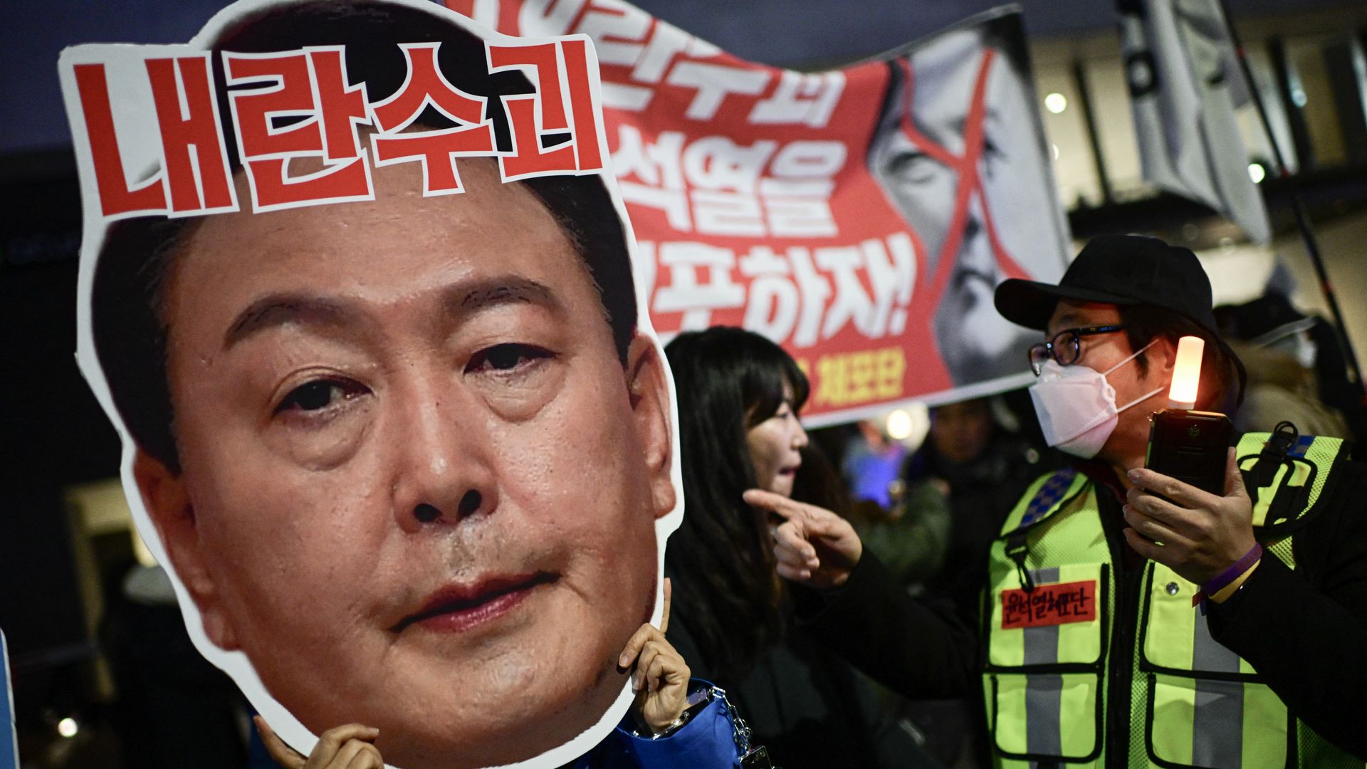 South Korean president hit with foreign travel ban after martial law mayhem