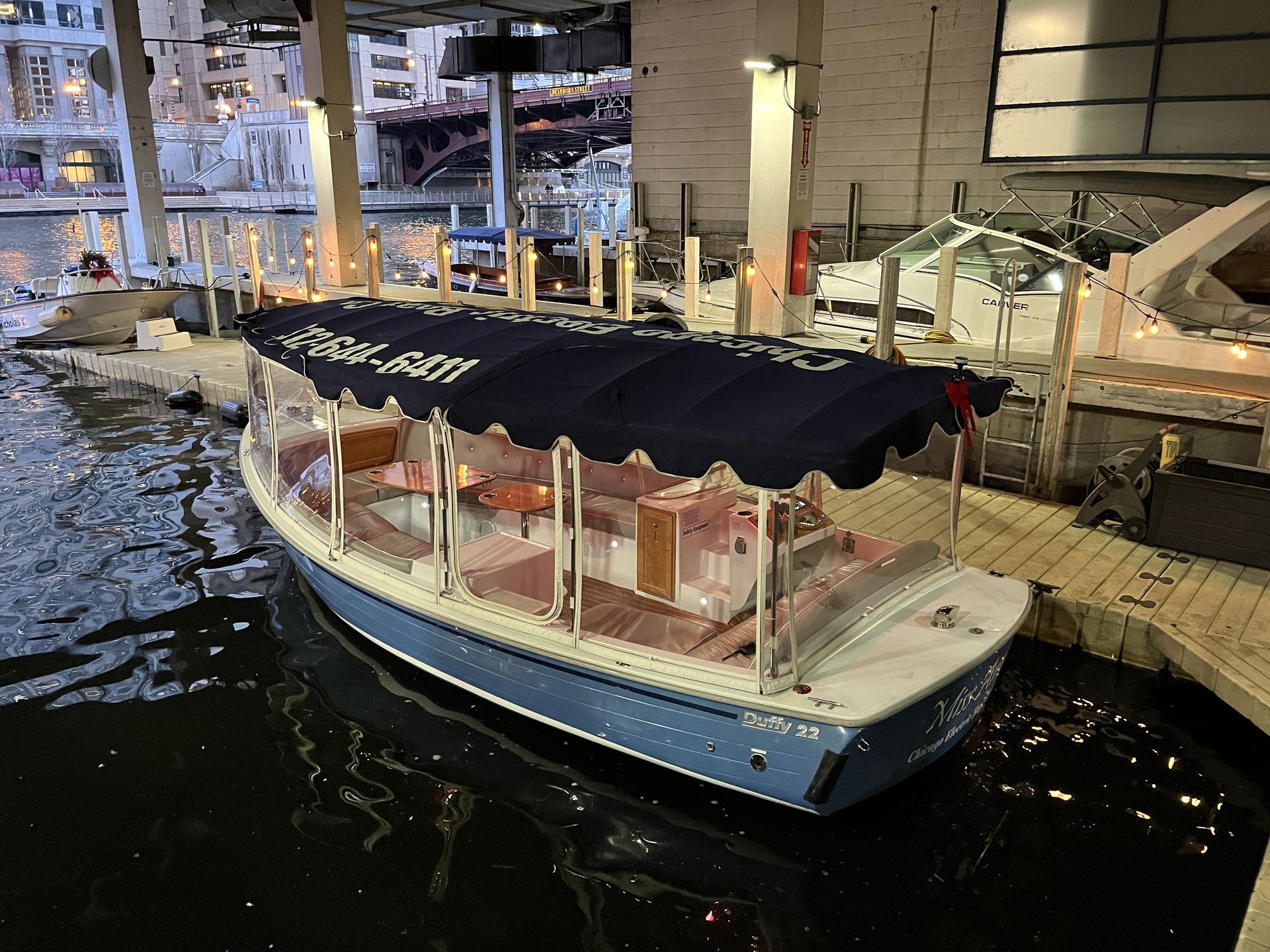 Test driving a Duffy boat on the Chicago River - Axios Chicago