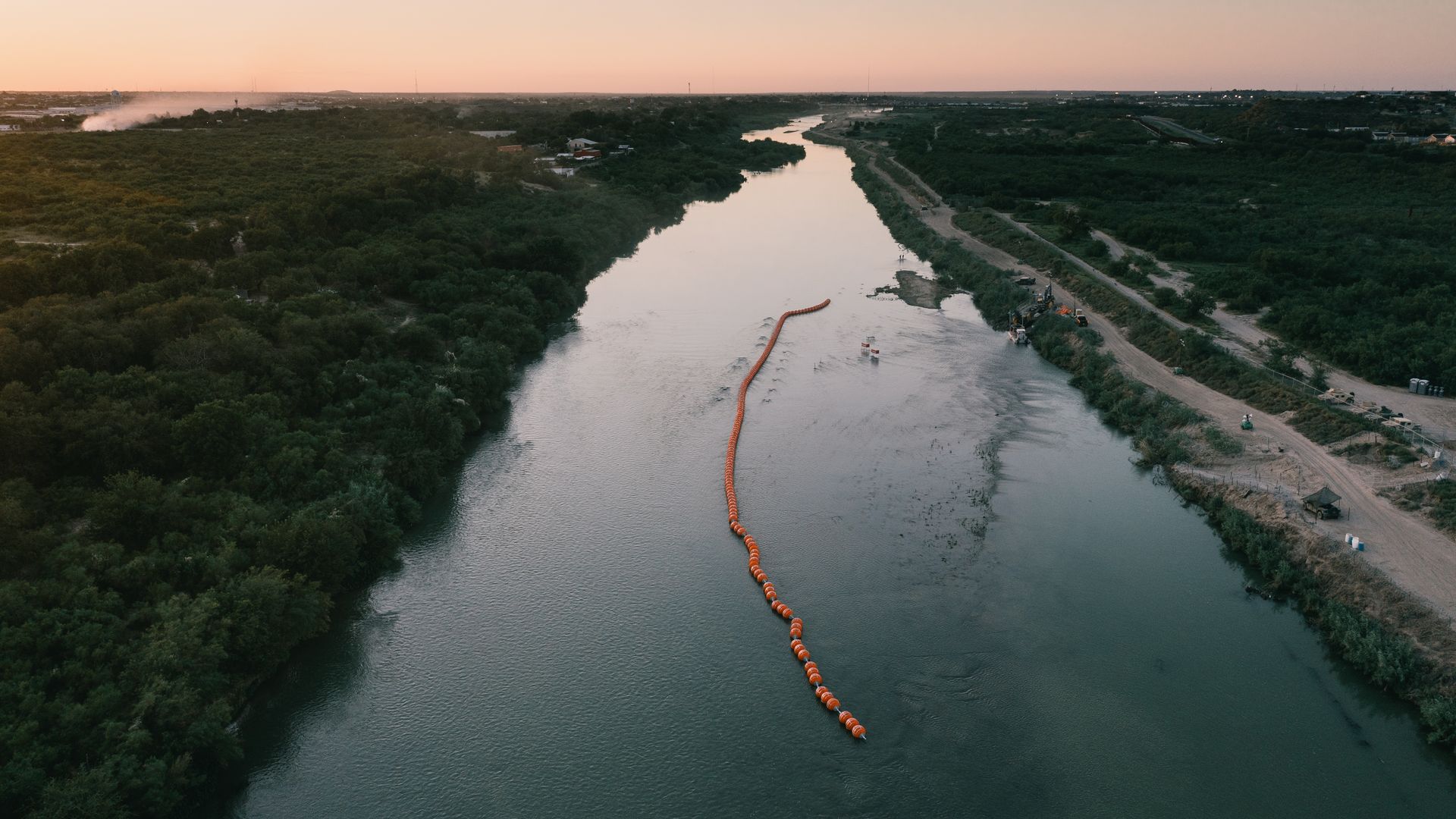 Texas can keep Rio Grande barrier buoys for now, court rules - Axios ...