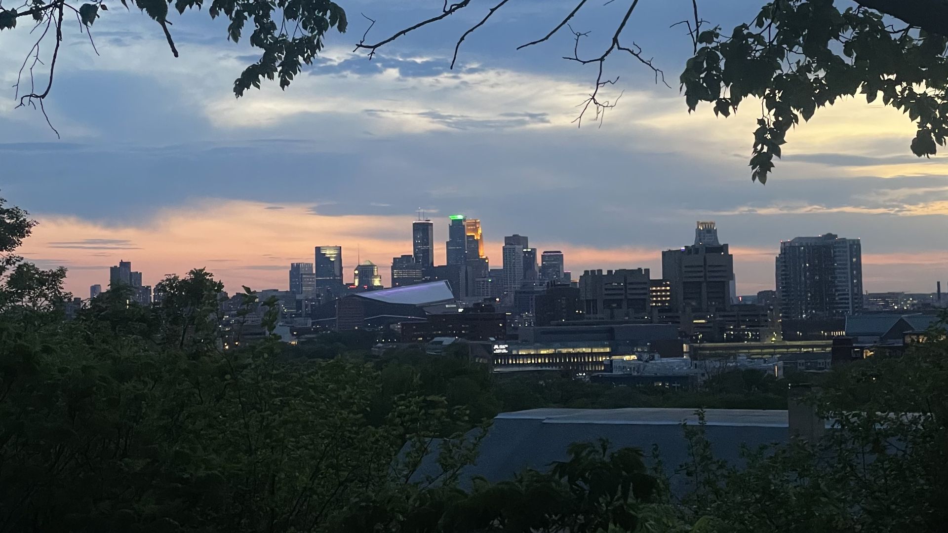 The view of the Minneapolis skyline at sunset.