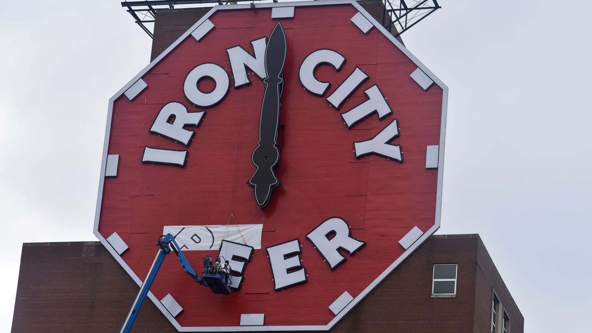 Iron City Beer rebrands famous clock in South Side - Axios Pittsburgh