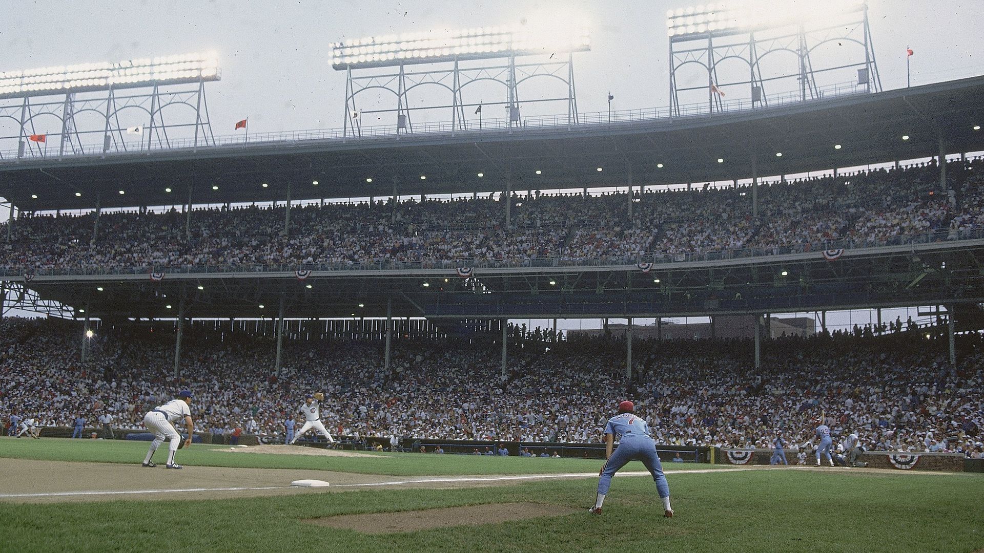 Photos: The night the lights came to Wrigley Field - Axios Chicago