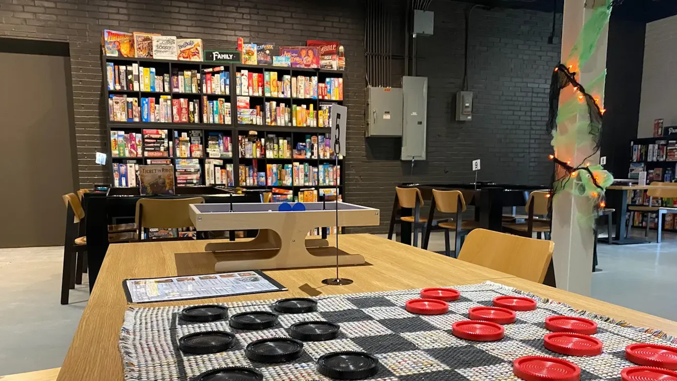 Board game cafe opens in Gibson Mill Market - Axios Charlotte