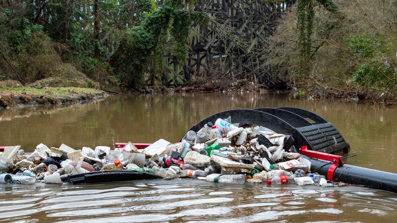 Trash traps keep litter and plastic bottles from floating downstream ...