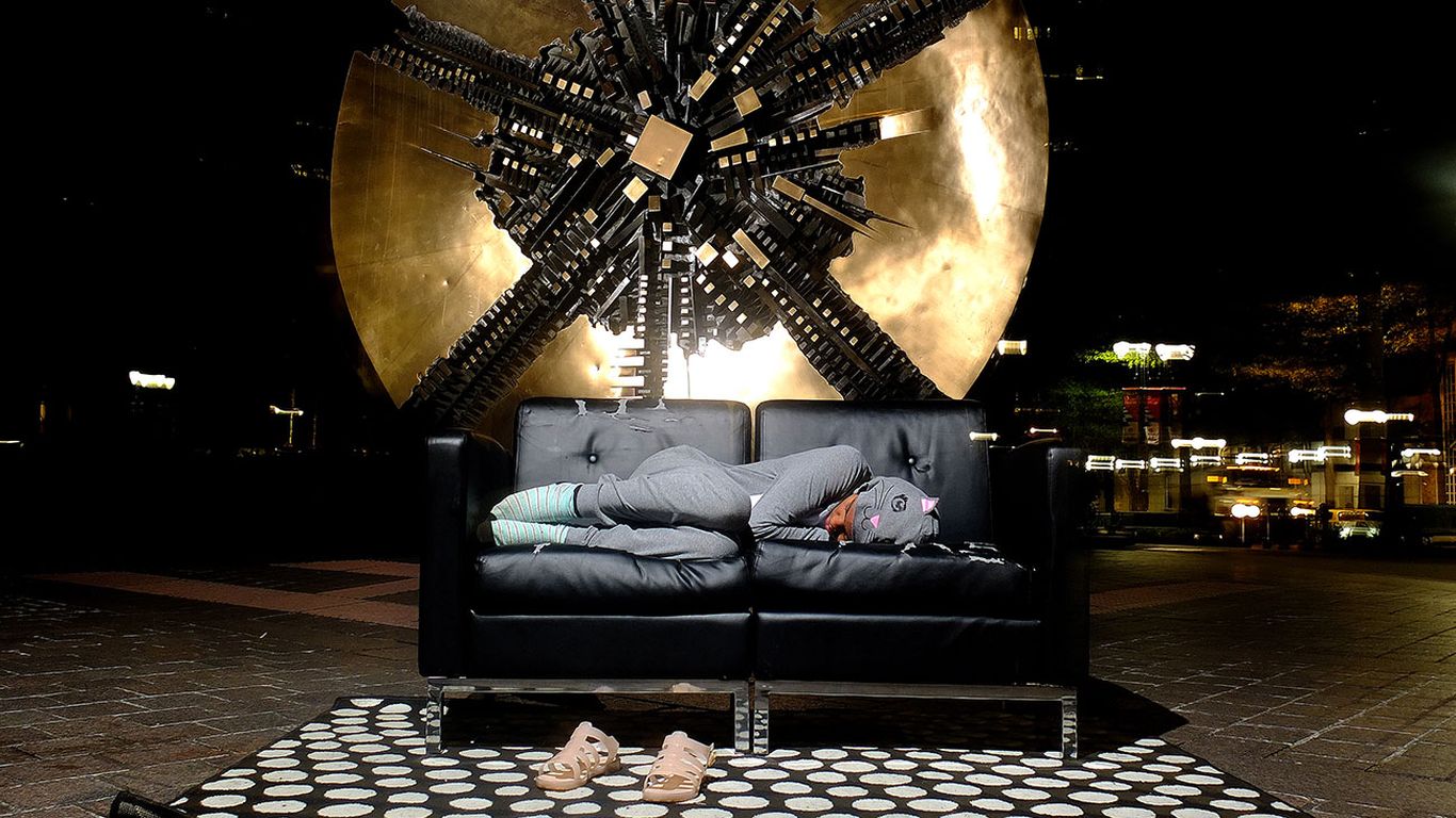 Photographer takes couch surfing to the streets, literally - Axios ...
