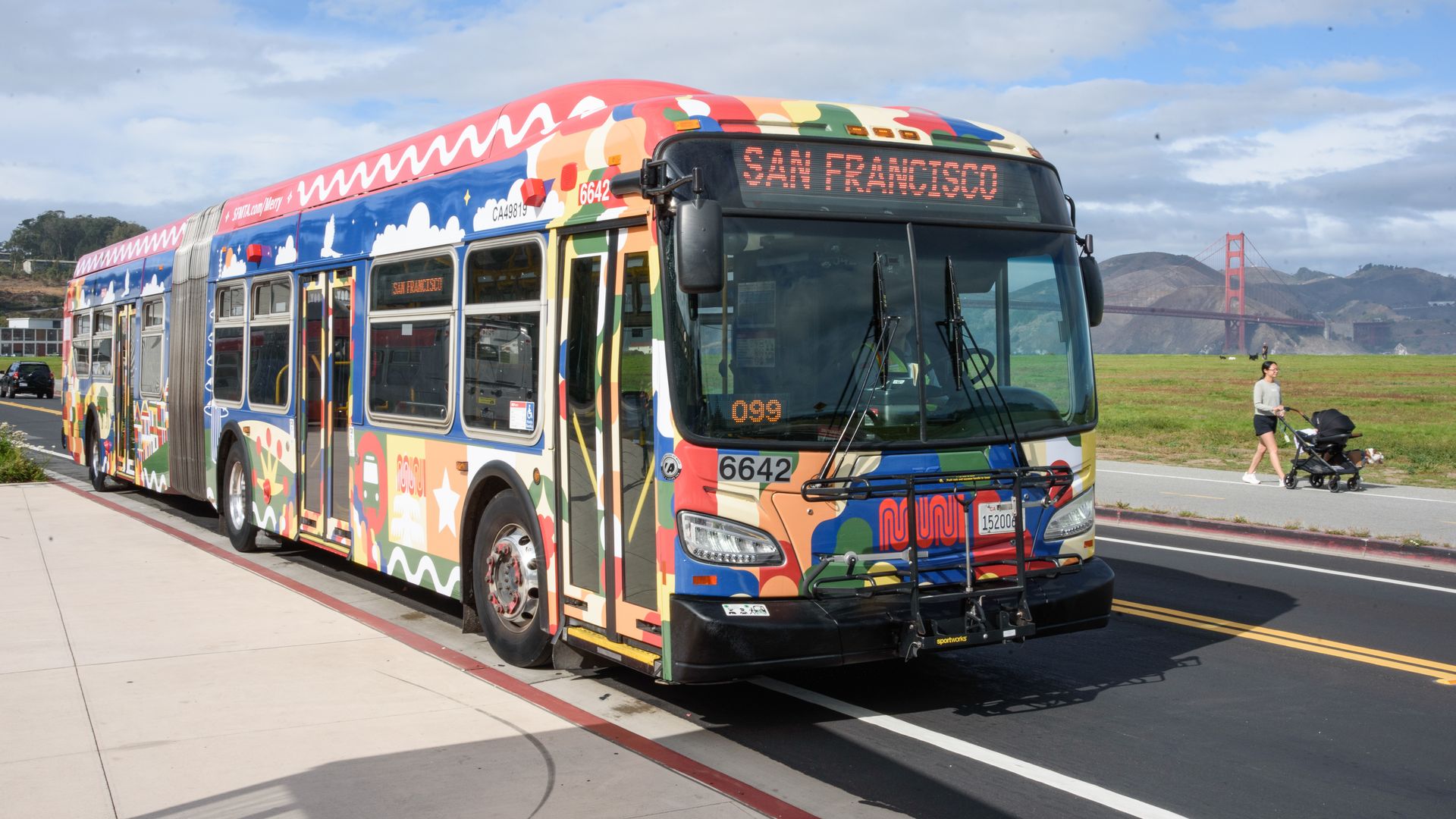 Muni's 49 Van Ness gets wrapped in vibrant holiday sweater design ...