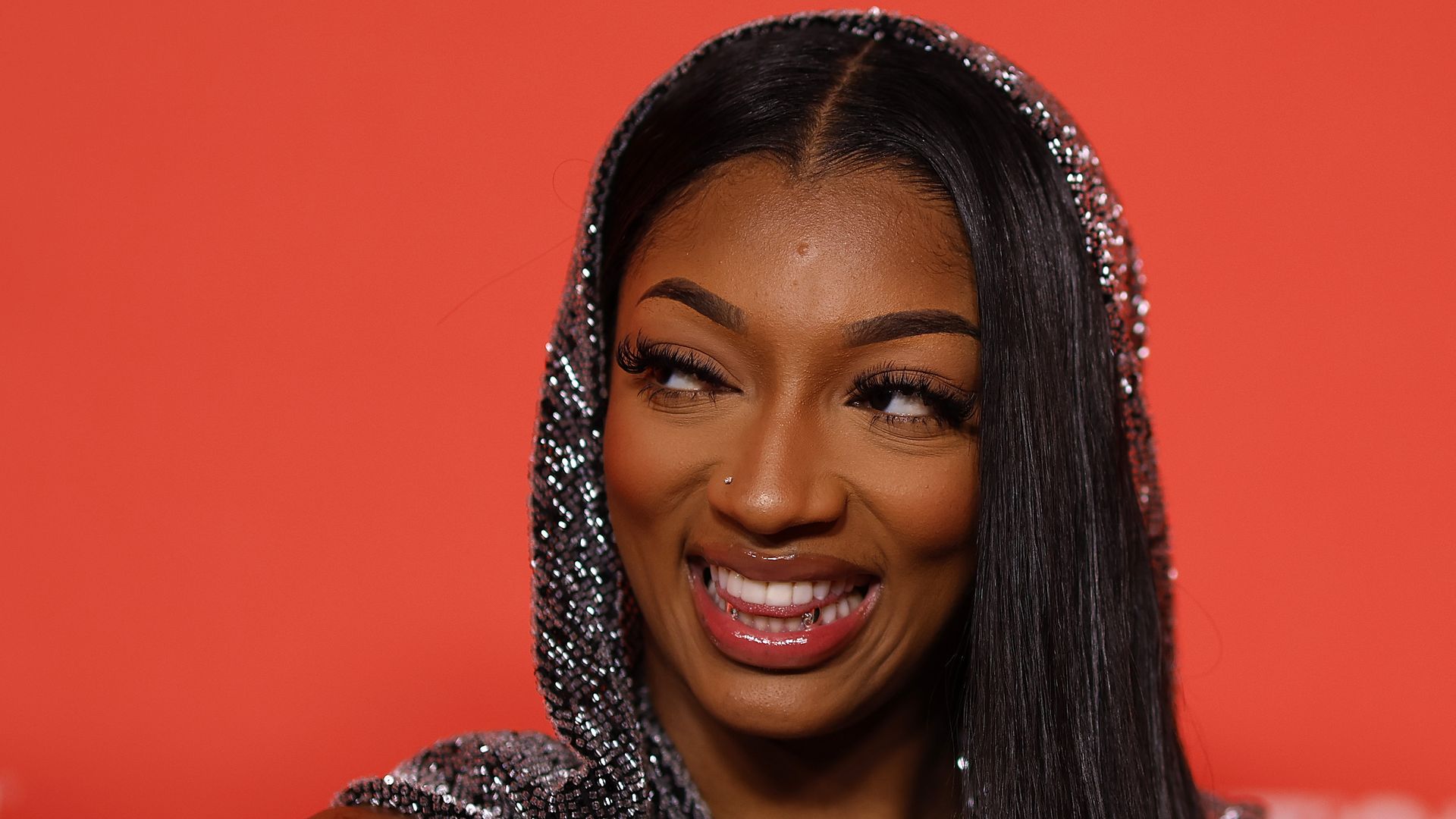 Photos: Angel Reese shines at WNBA draft in backless dress - Axios New Orleans