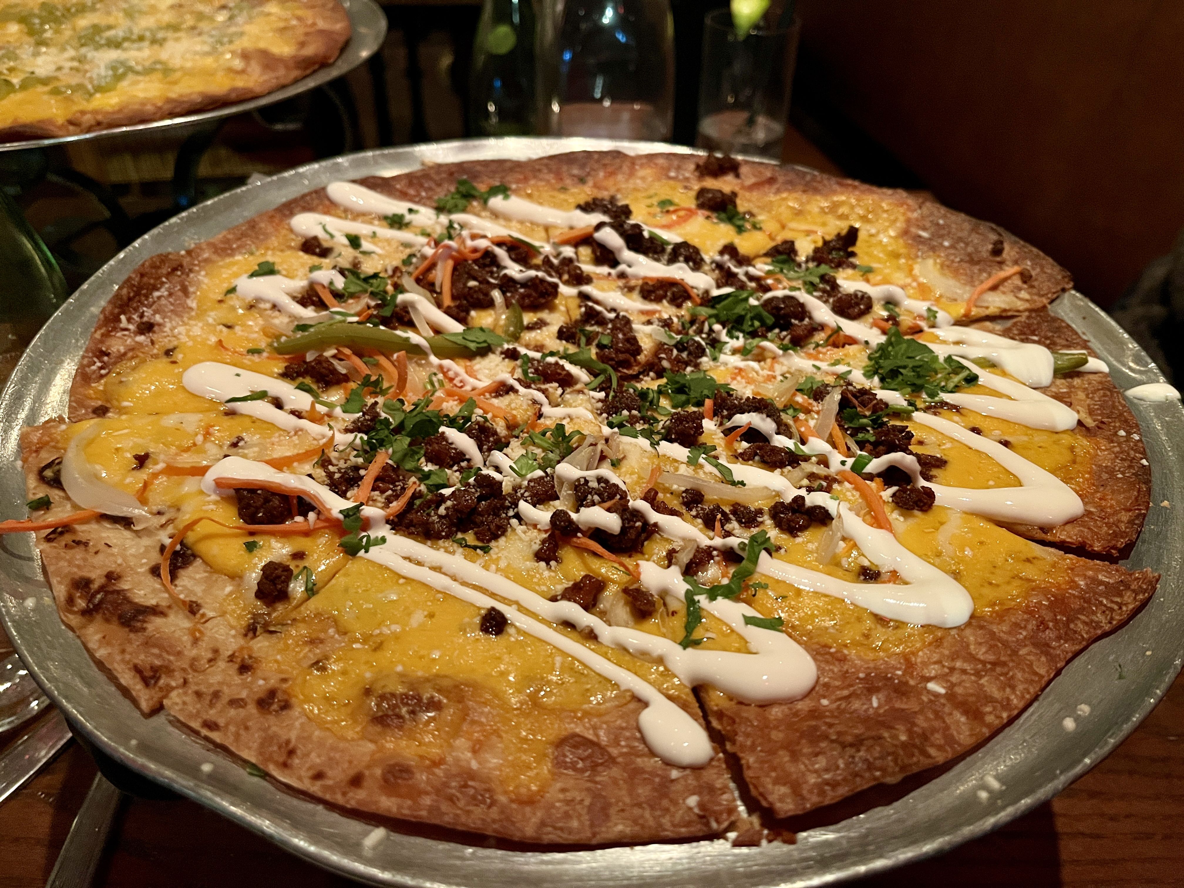 Discover the Home of the Cheese Crisp in Lincoln Park - Axios Chicago