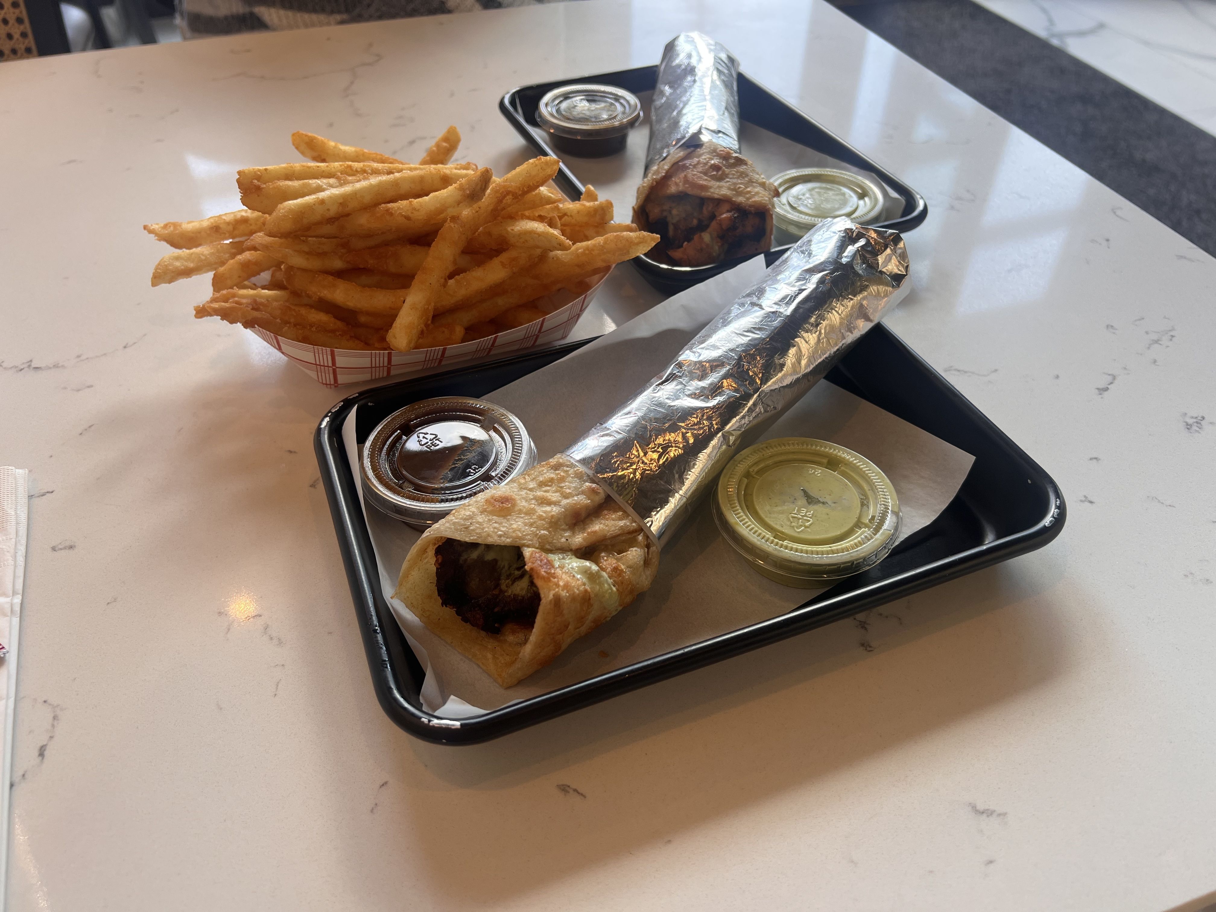 Food Street introduces Clintonville to Pakistani favorites - Axios Columbus