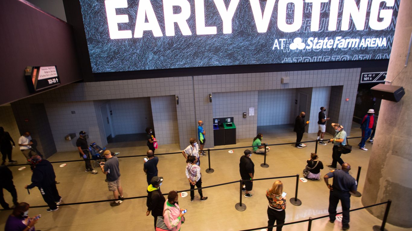 Georgia early in-person voting begins with record turnout — photos