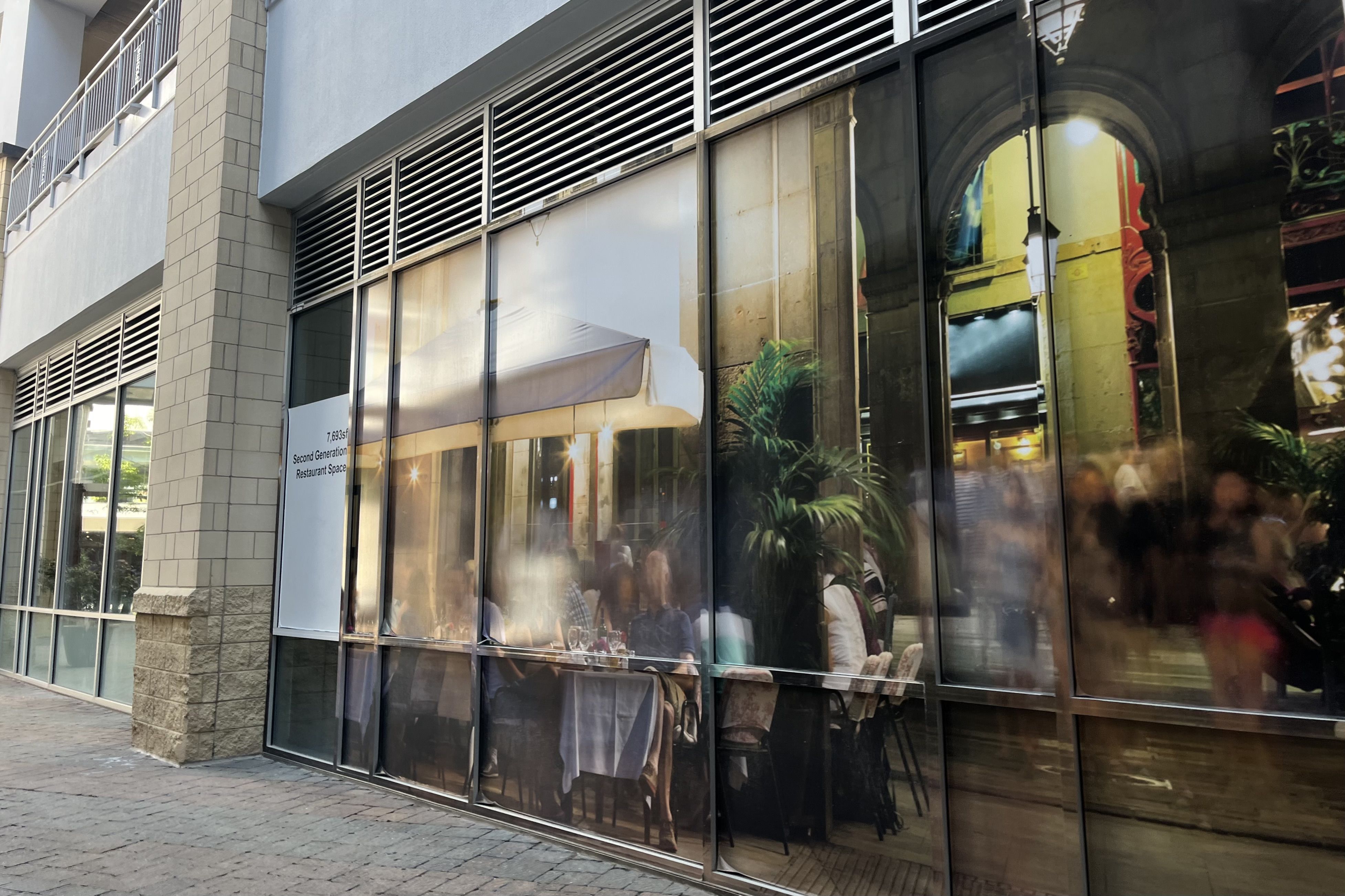 "A crowd draws a crowd:" New businesses open at Queen City Quarter, but ...