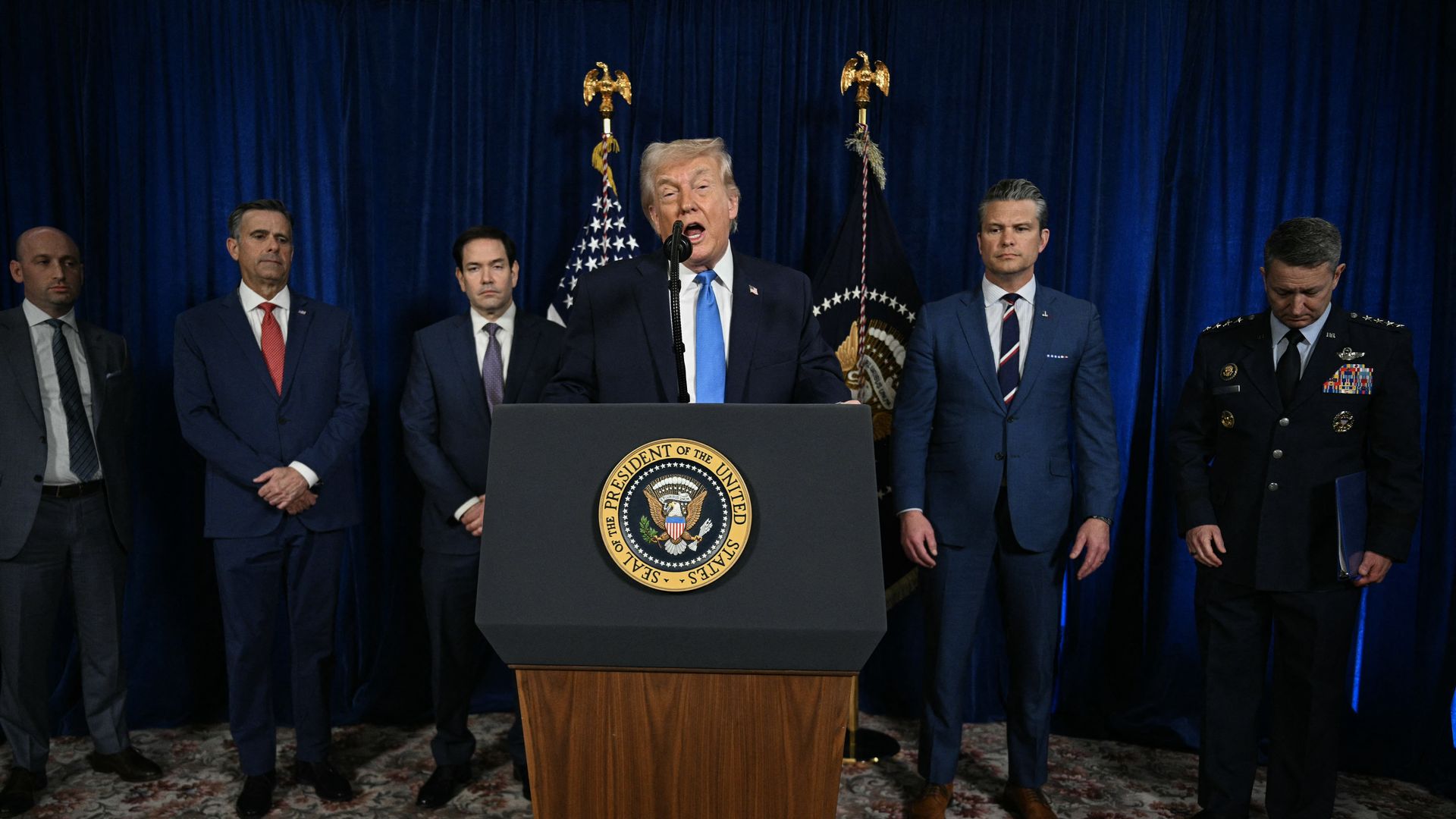 Trump: "We're going to run" Venezuela until power can be transferred