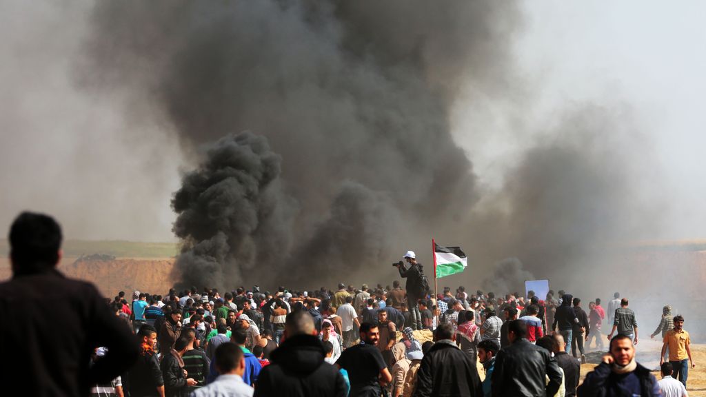 Gaza unrest escalates after journalist in "PRESS" vest killed