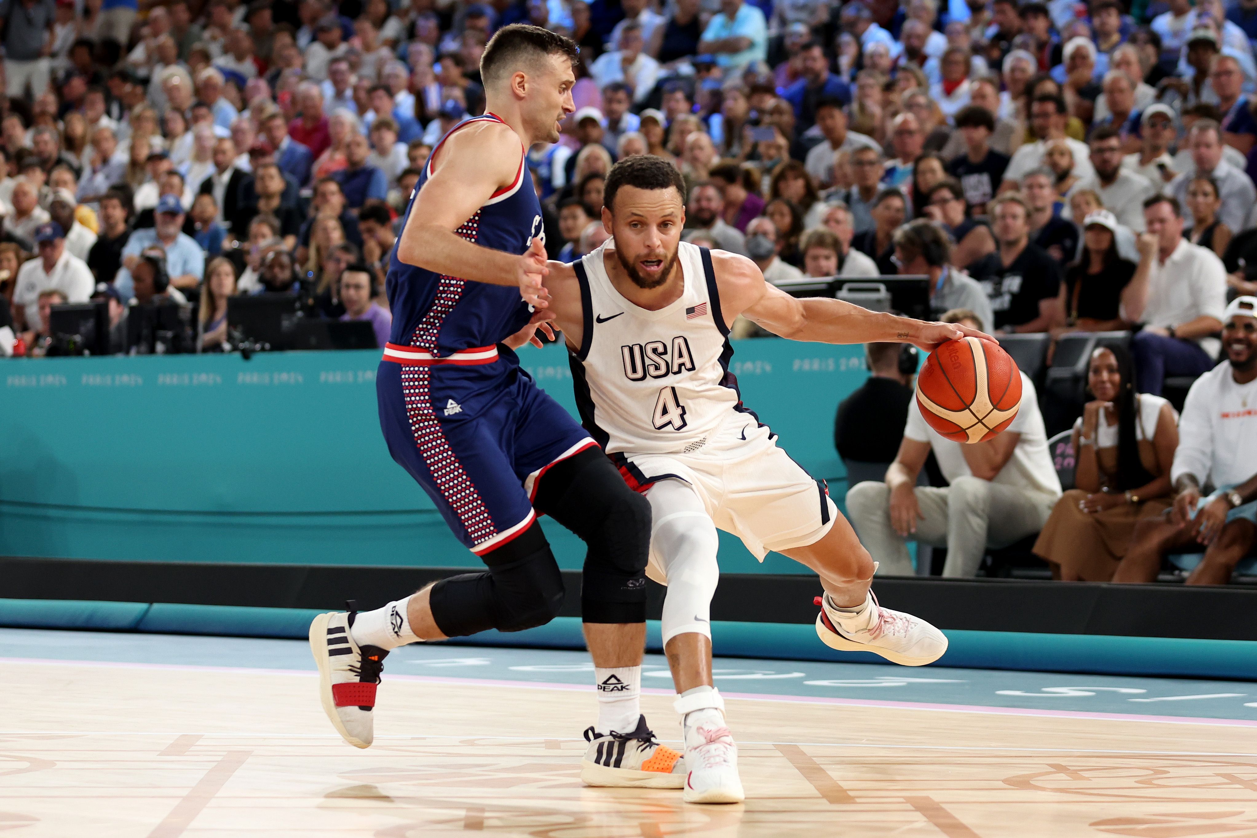 In photos: The Warriors' Steph Curry triumphs in Paris - Axios San ...