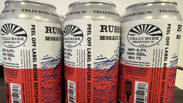 Peel your beer labels before recycling cans, brewers say - Axios Denver