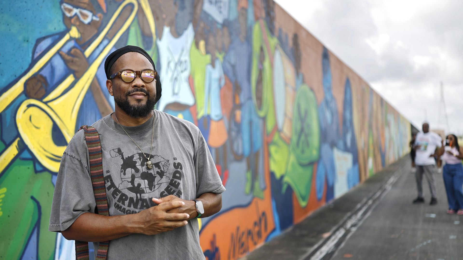 Brandan "BMike" Odums, student artists create Lower Ninth Ward mural - Axios New Orleans