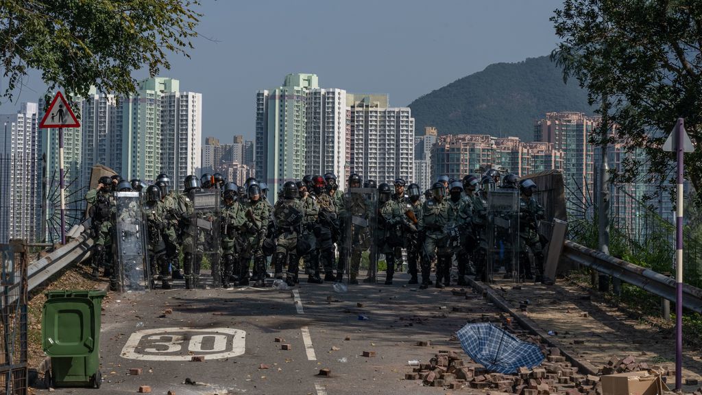 Violence in Hong Kong as leader denounces "enemies of the people"
