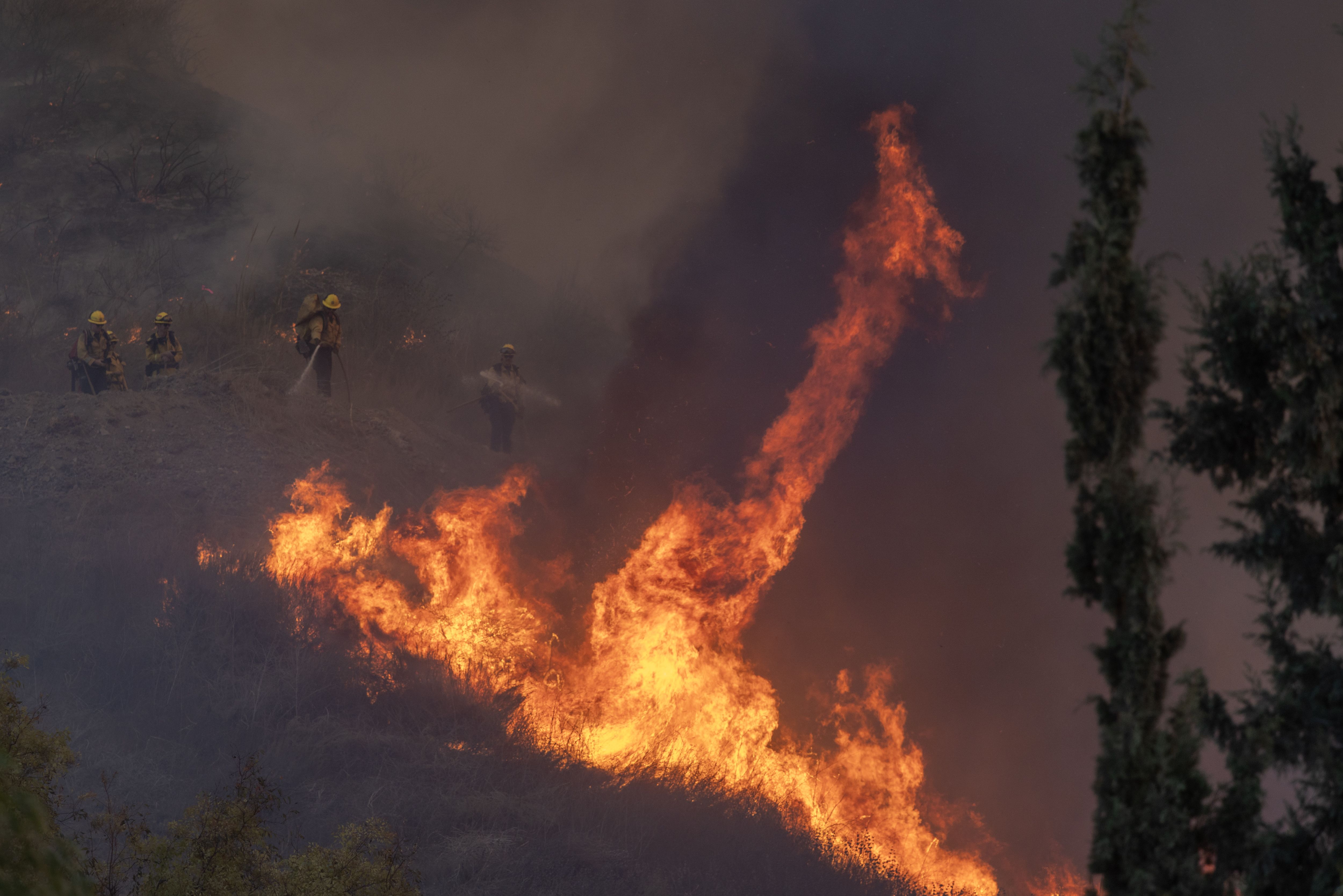 Photos: California's Mountain fire burns homes prompts evacuations