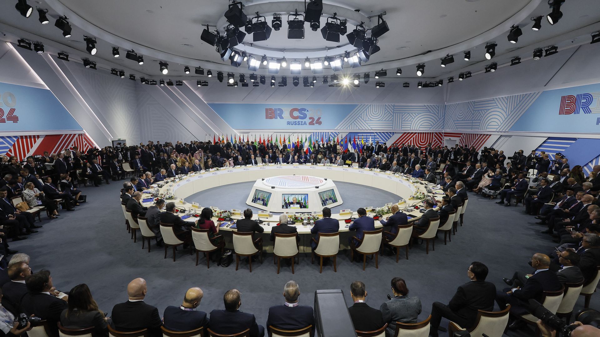 Trump threatens 100% tariffs on BRICS nations over dollar support