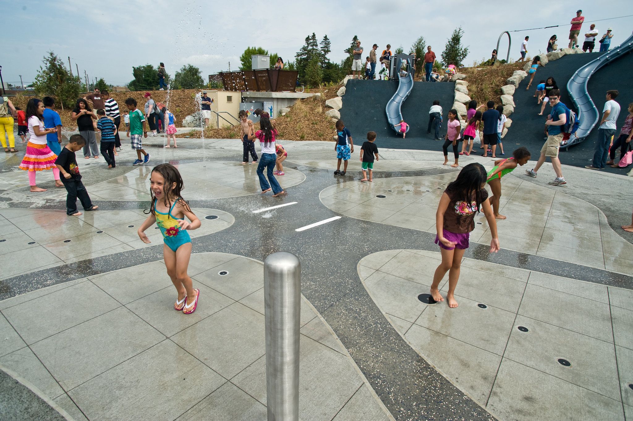 Why spray parks are everywhere in Seattle this summer - Axios Seattle