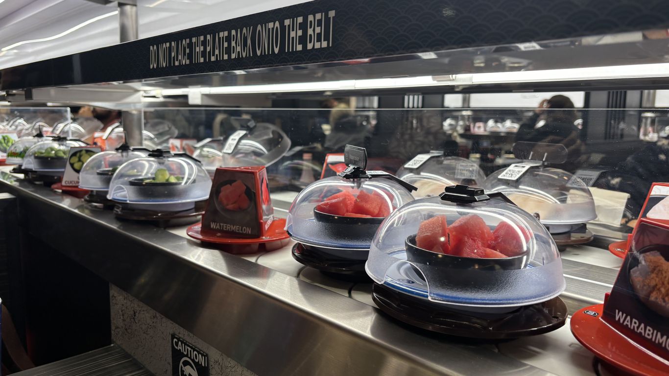 Kura Revolving Sushi's conveyor belt delivers food and fun - Axios ...