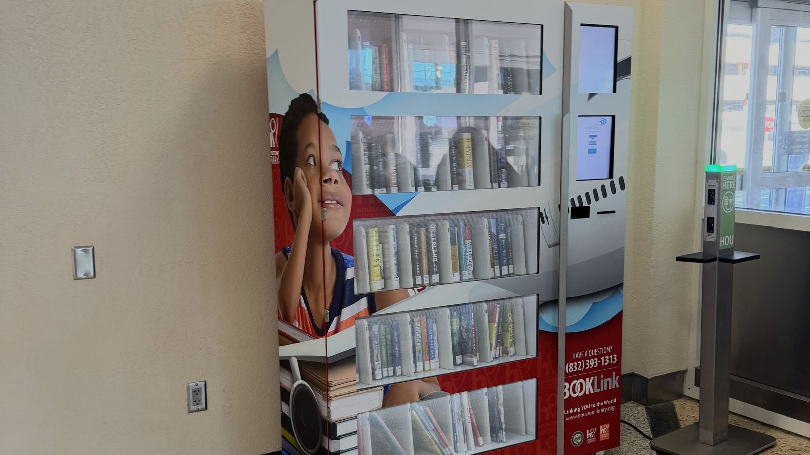 Houston's Hobby Airport now has a small library vending machine - Axios ...