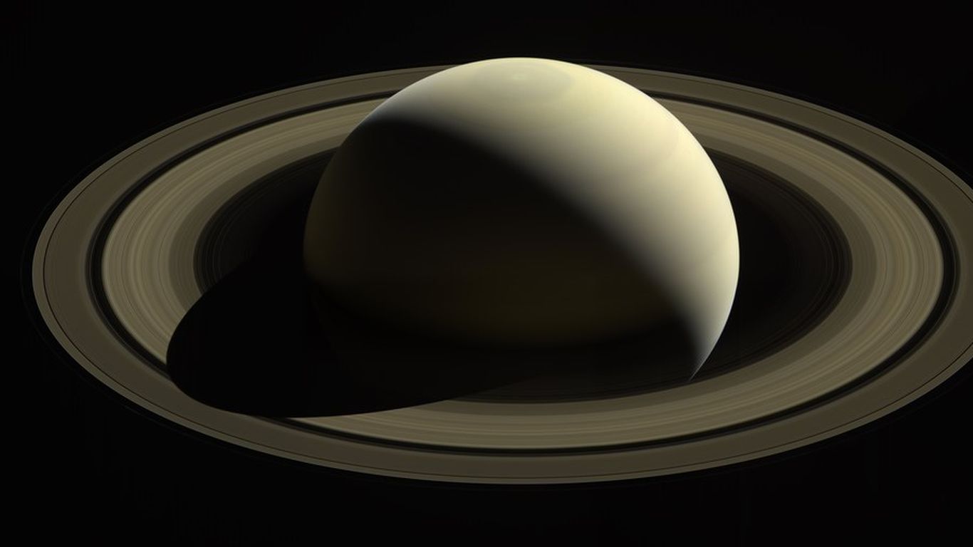Saturn's rings might shower the planet with dust